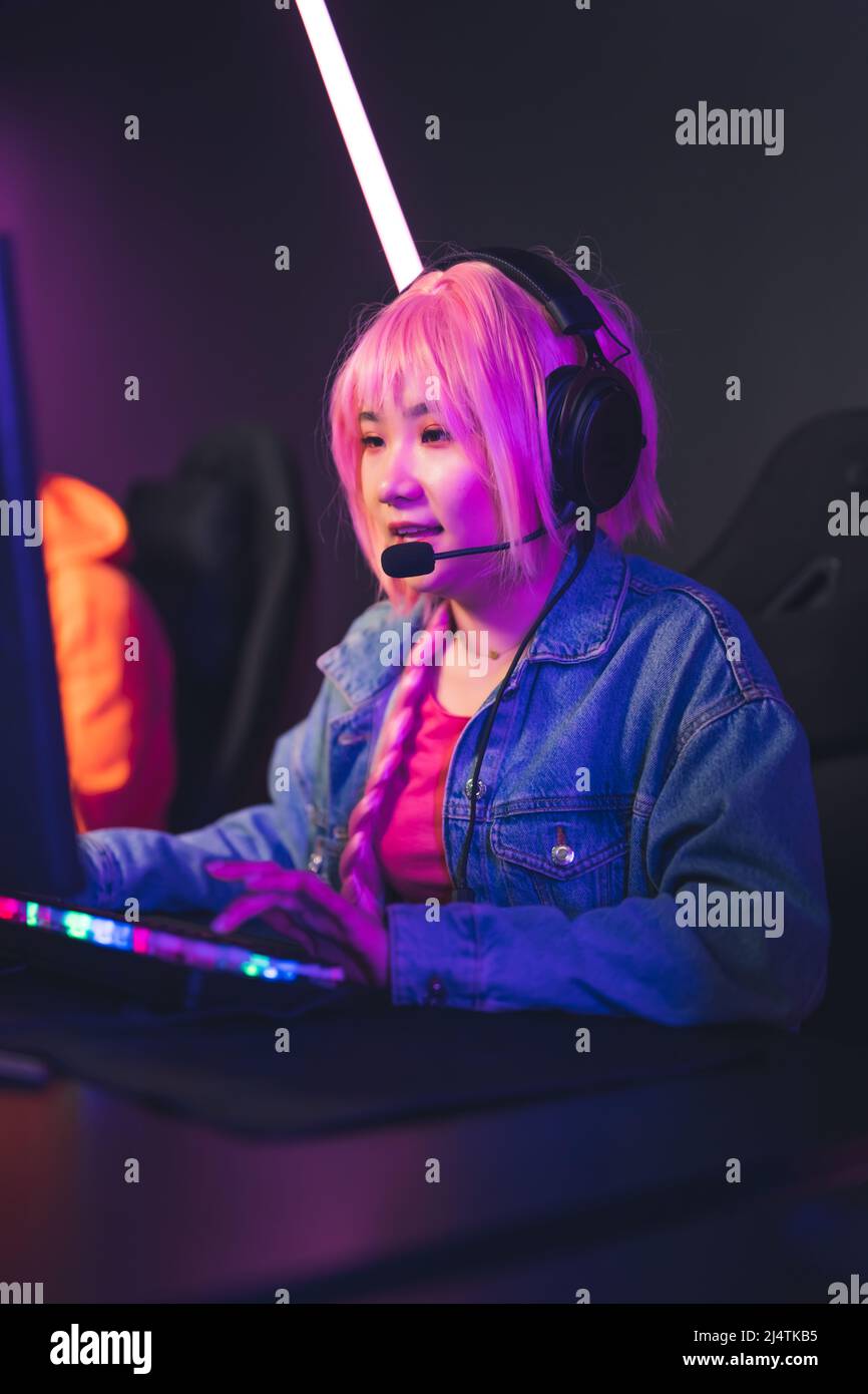 Portrait Streamer young woman professional gamer playing online games ...