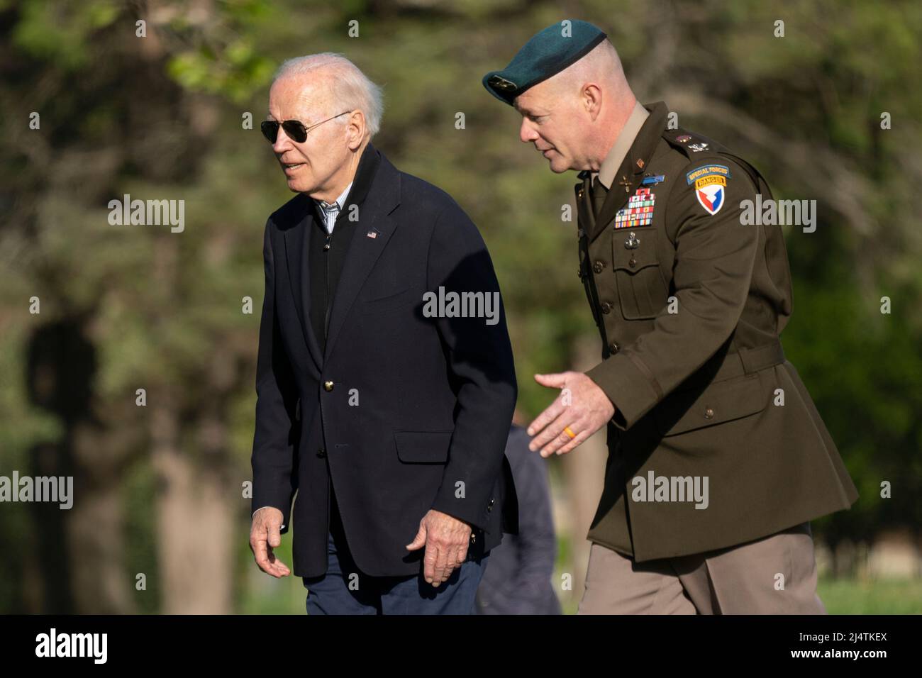 United States President Joe Biden, escorted by Col. David D. Bowling ...