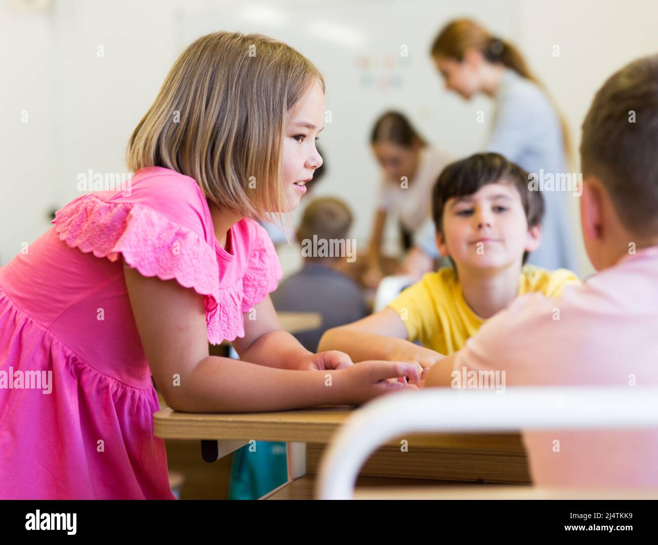 Children performing group tasks Stock Photo - Alamy