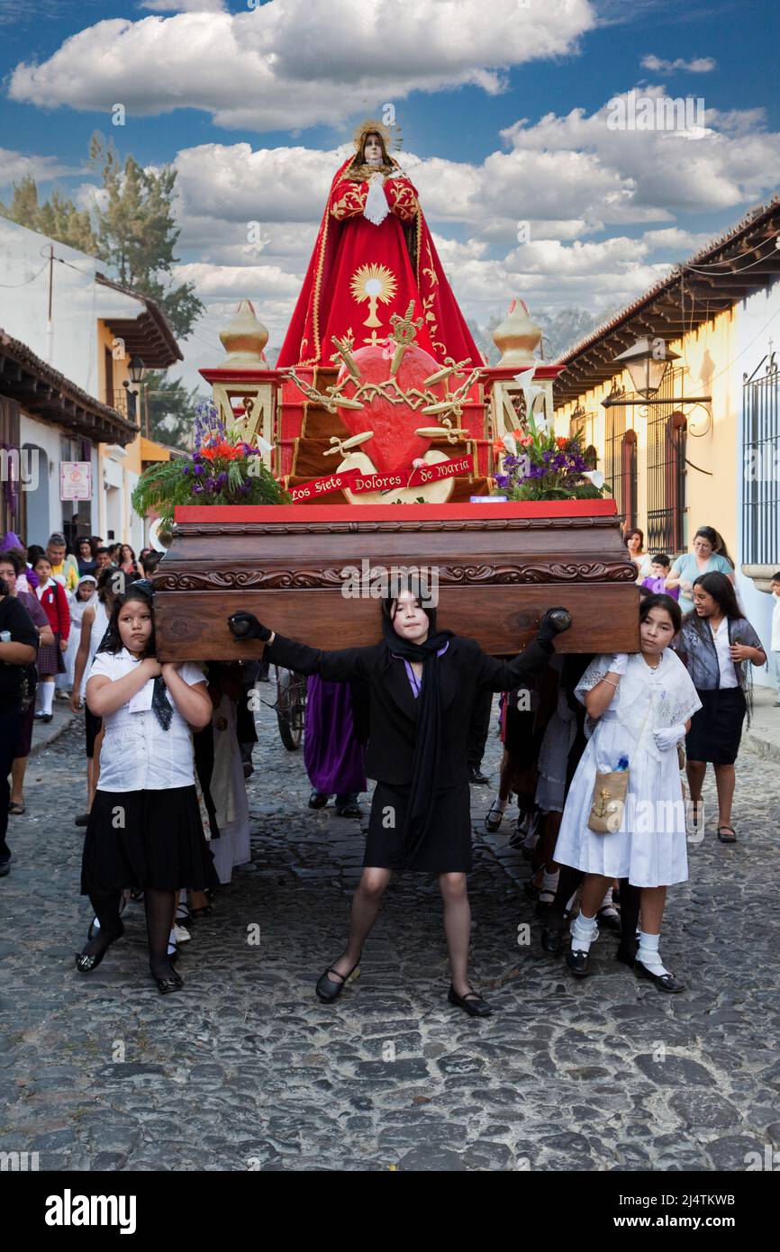 Antigua, Guatemala. Semana Santa (Holy Week). Young Girls Carrying an ...