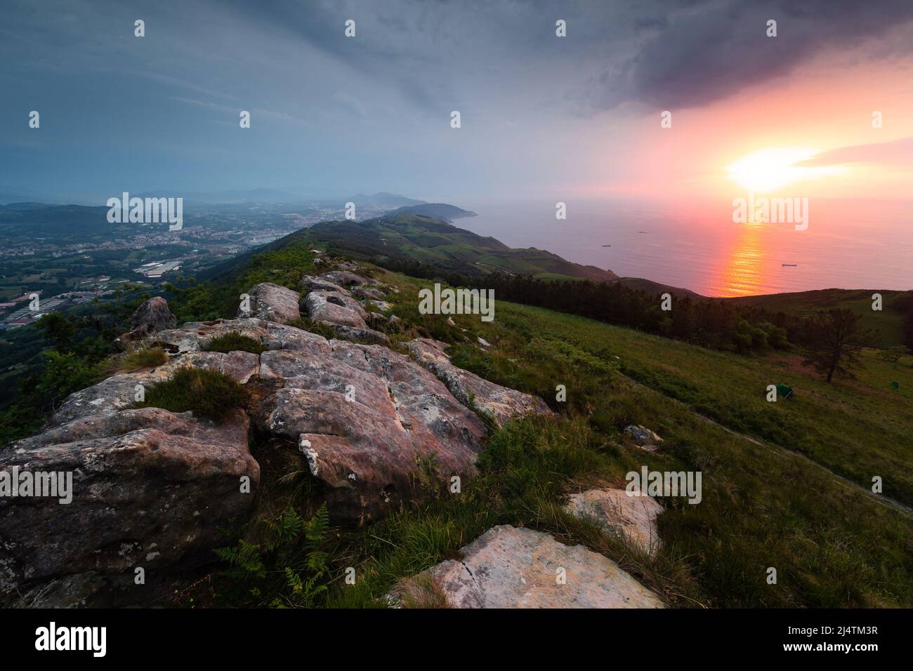 Sunset at the sea seen from the top of Jaizkibel mountain at the basque ...