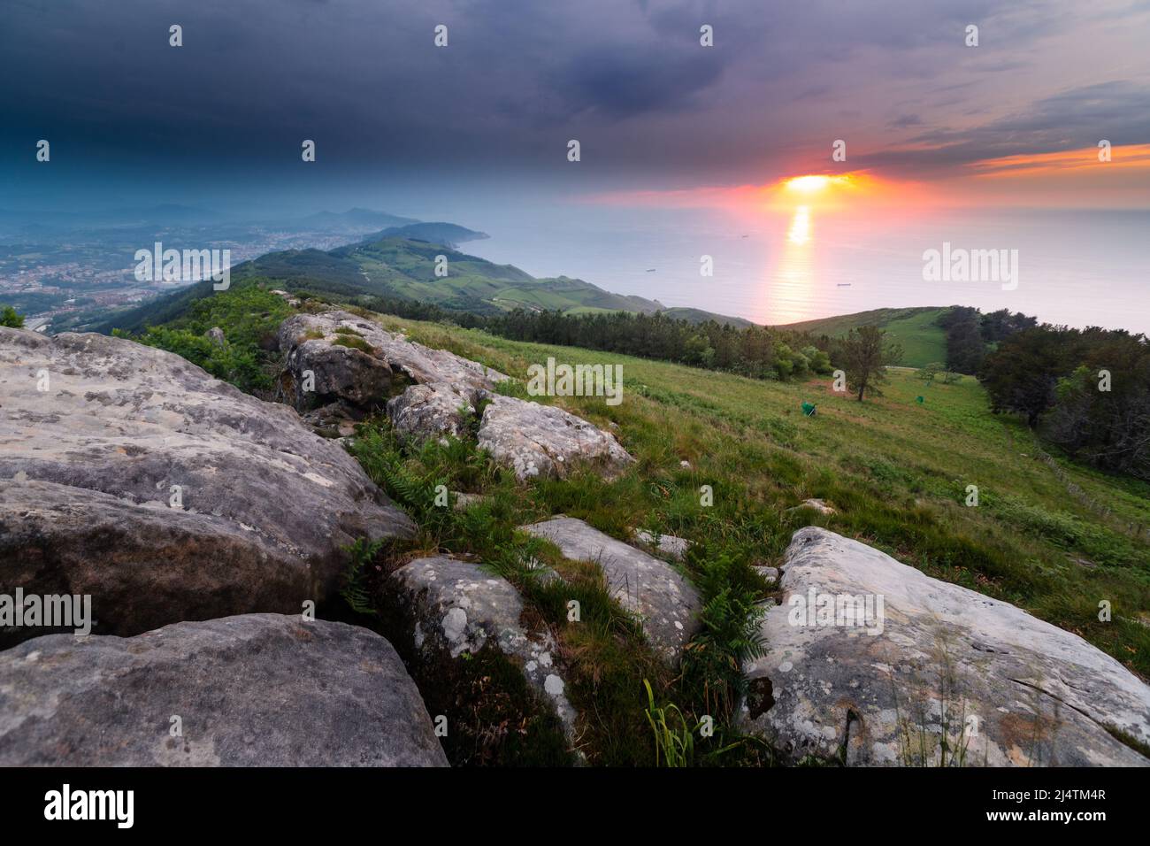 Sunset at the sea seen from the top of Jaizkibel mountain at the basque ...