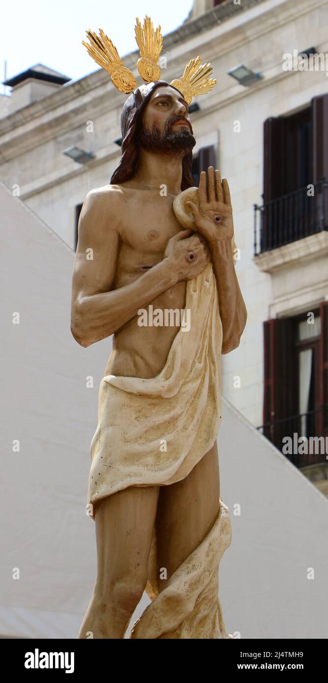 Carved wooden figure of Jesus Christ on a wheeled float in the Plaza ...
