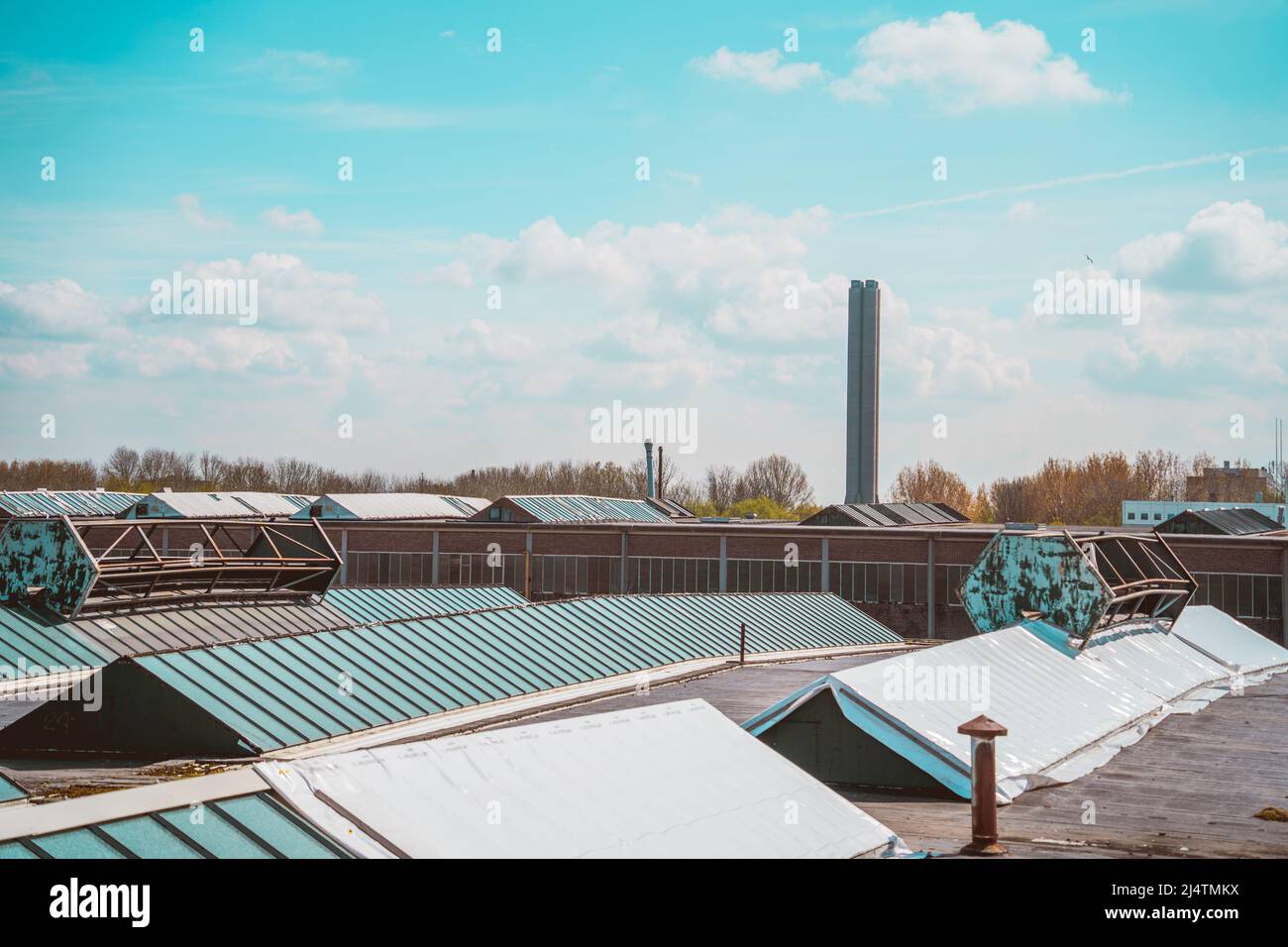 Rooftop of an abandoned industrial building Stock Photo - Alamy