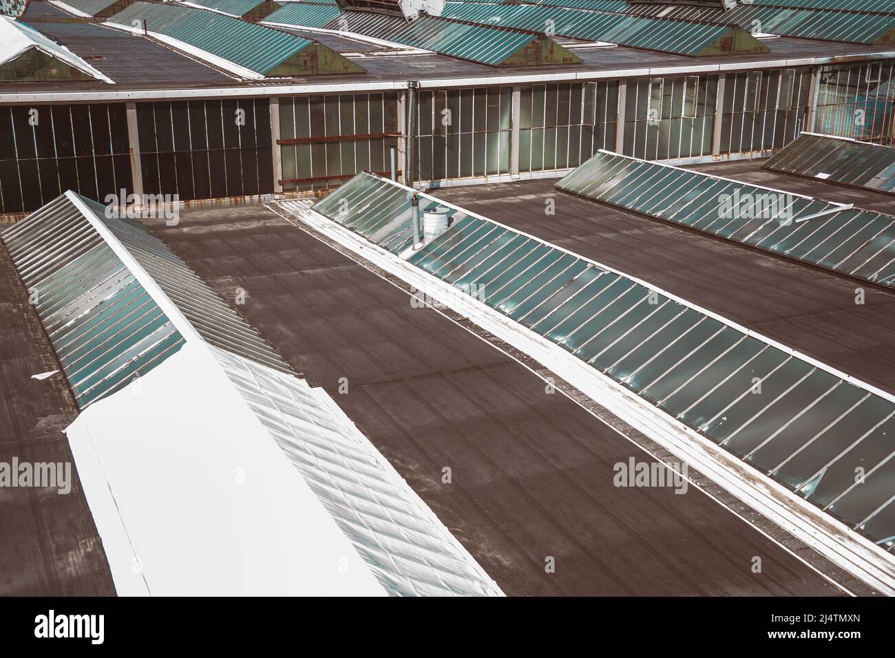 Rooftop of an abandoned warehouse Stock Photo - Alamy