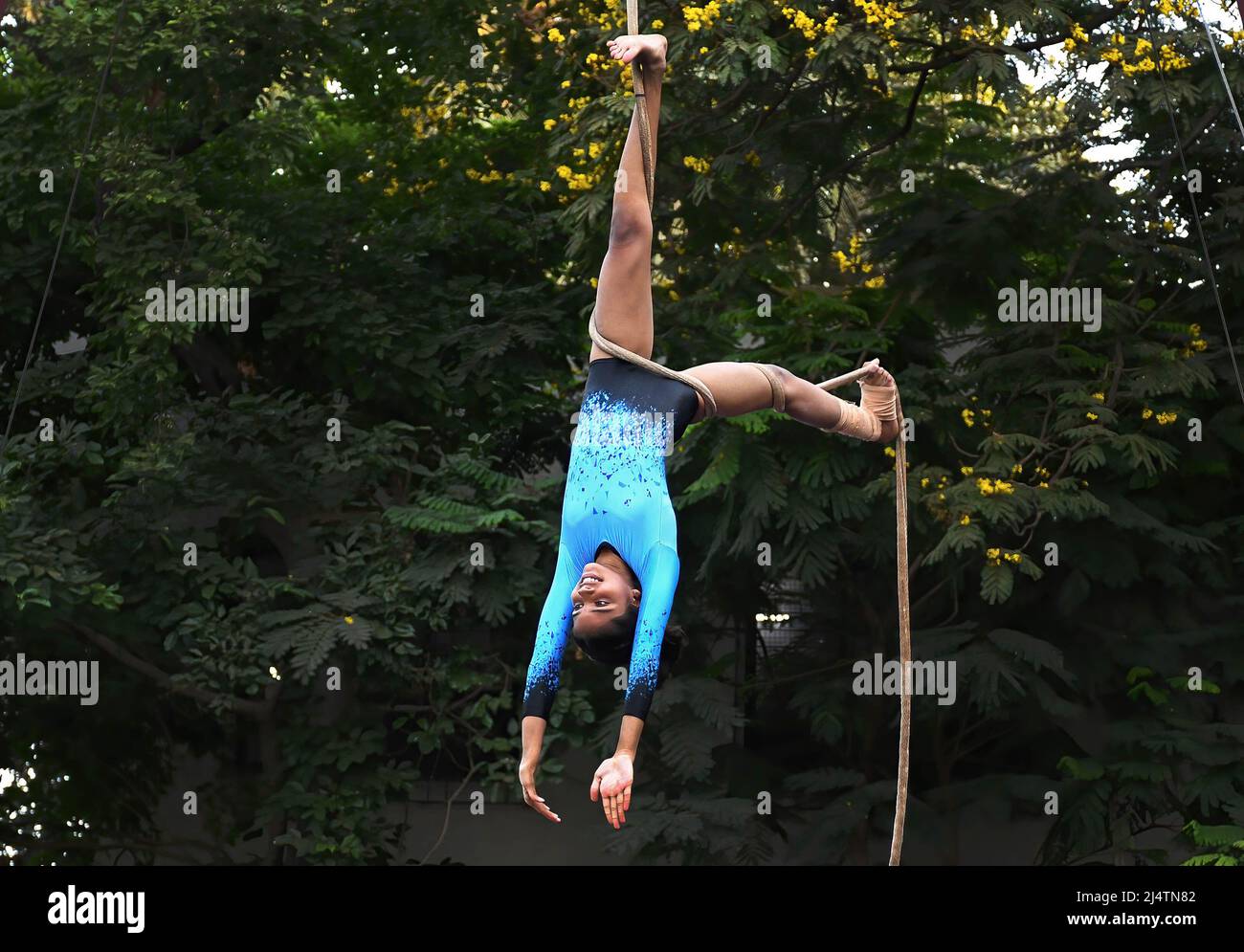 Girl hanging on pole hi-res stock photography and images - Alamy