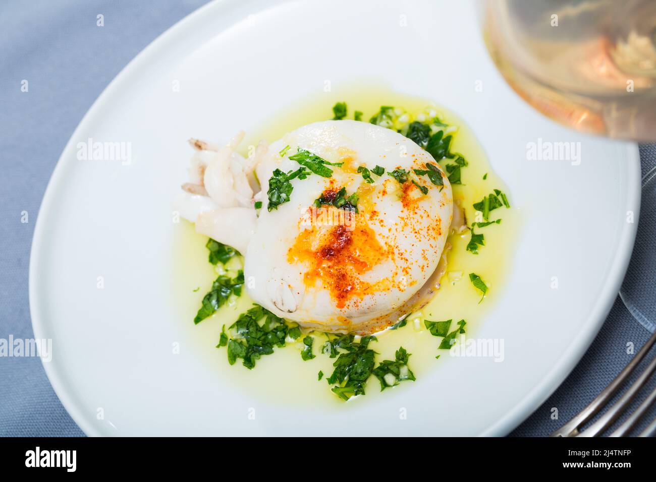 Dish of Mediterranean cuisine - roasted cuttlefish Stock Photo - Alamy