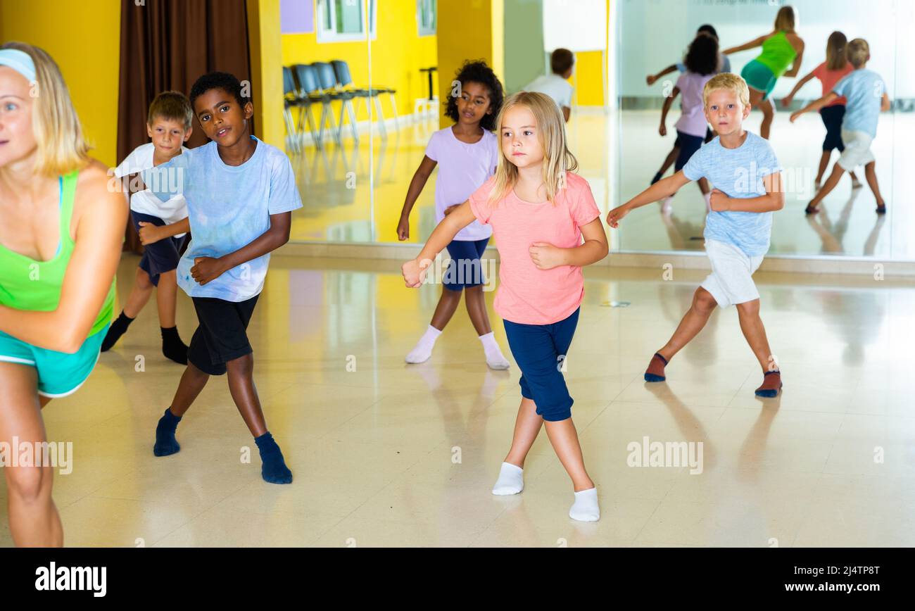 Active young children posing at dance class Stock Photo - Alamy