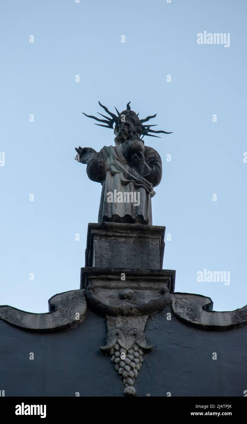 Statue above the entrance of St. Nicholas' Church and Art Museum ...