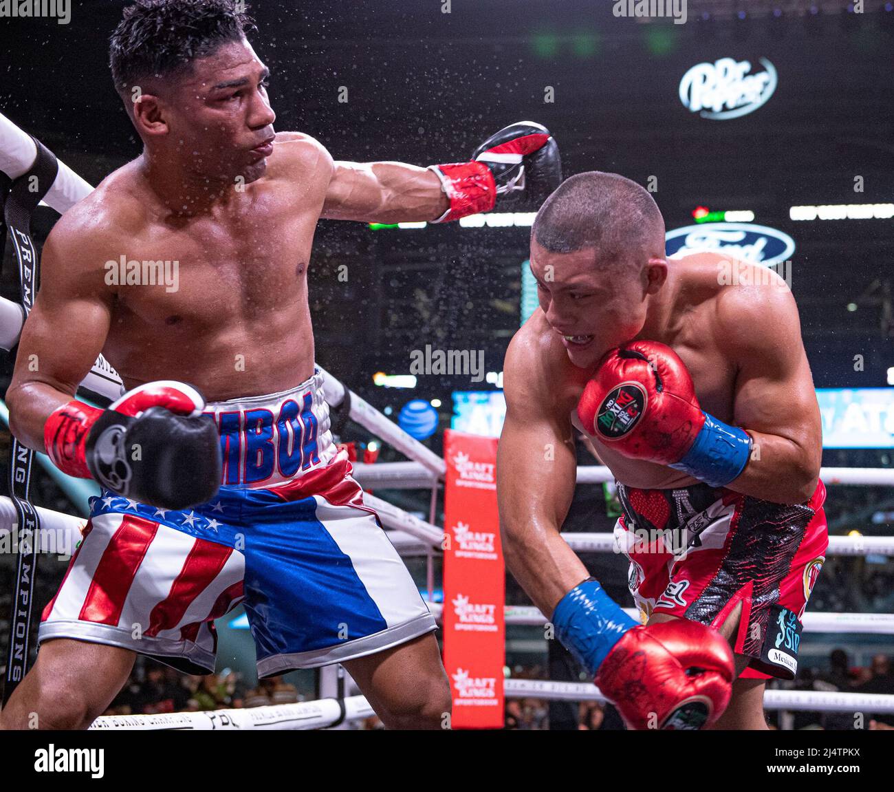 ARLINGTON, TX - APRIL 16: (R-L) Isaac Cruz punches Yuriorkis Gamboa ...