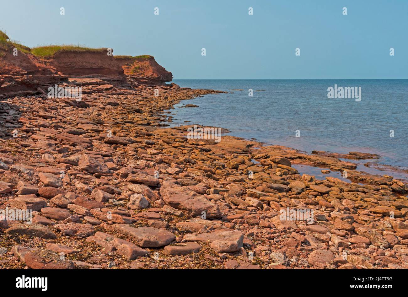Rocky Coastline and Grassy Cliffs on The North Cape of Prince Edward ...
