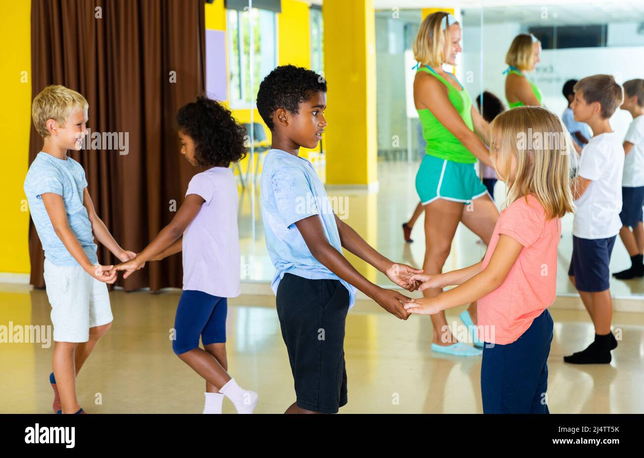 Little boys and girls dancing pair dance in the ballet studio Stock ...