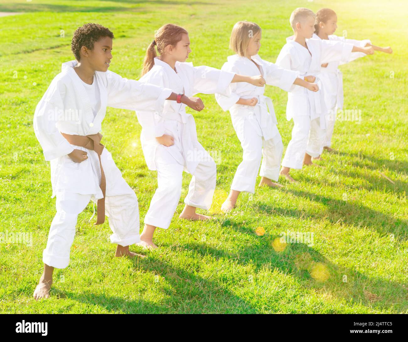 Young children doing karate hi-res stock photography and images - Alamy