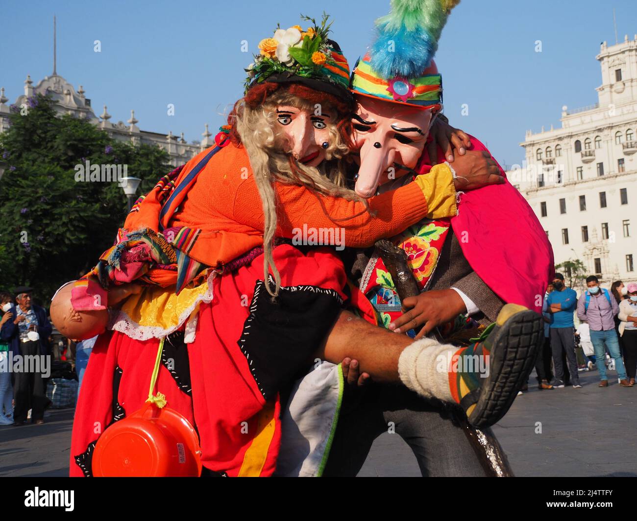 Indigenous dancers in colorful costumes use to dance in the streets of ...