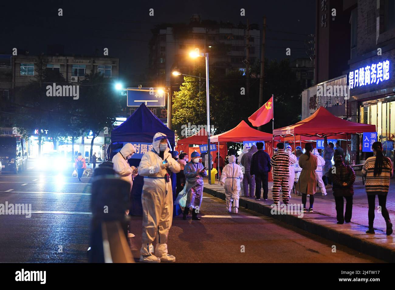 GUIYANG, CHINA - APRIL 17, 2022 - People queue up for temperature ...