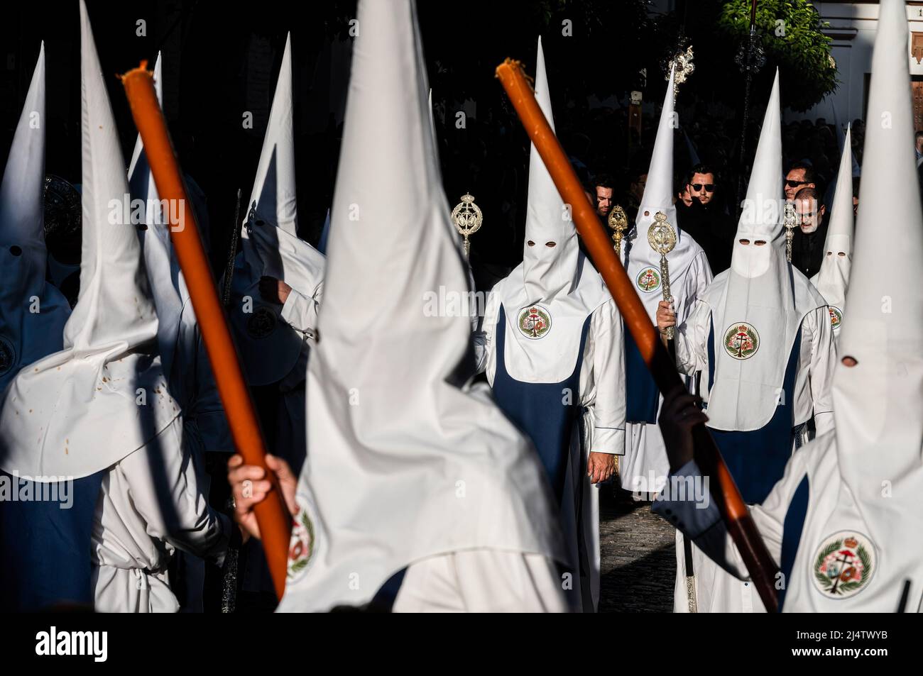 Penitents march during a procession as they celebrate the Holy Week ...