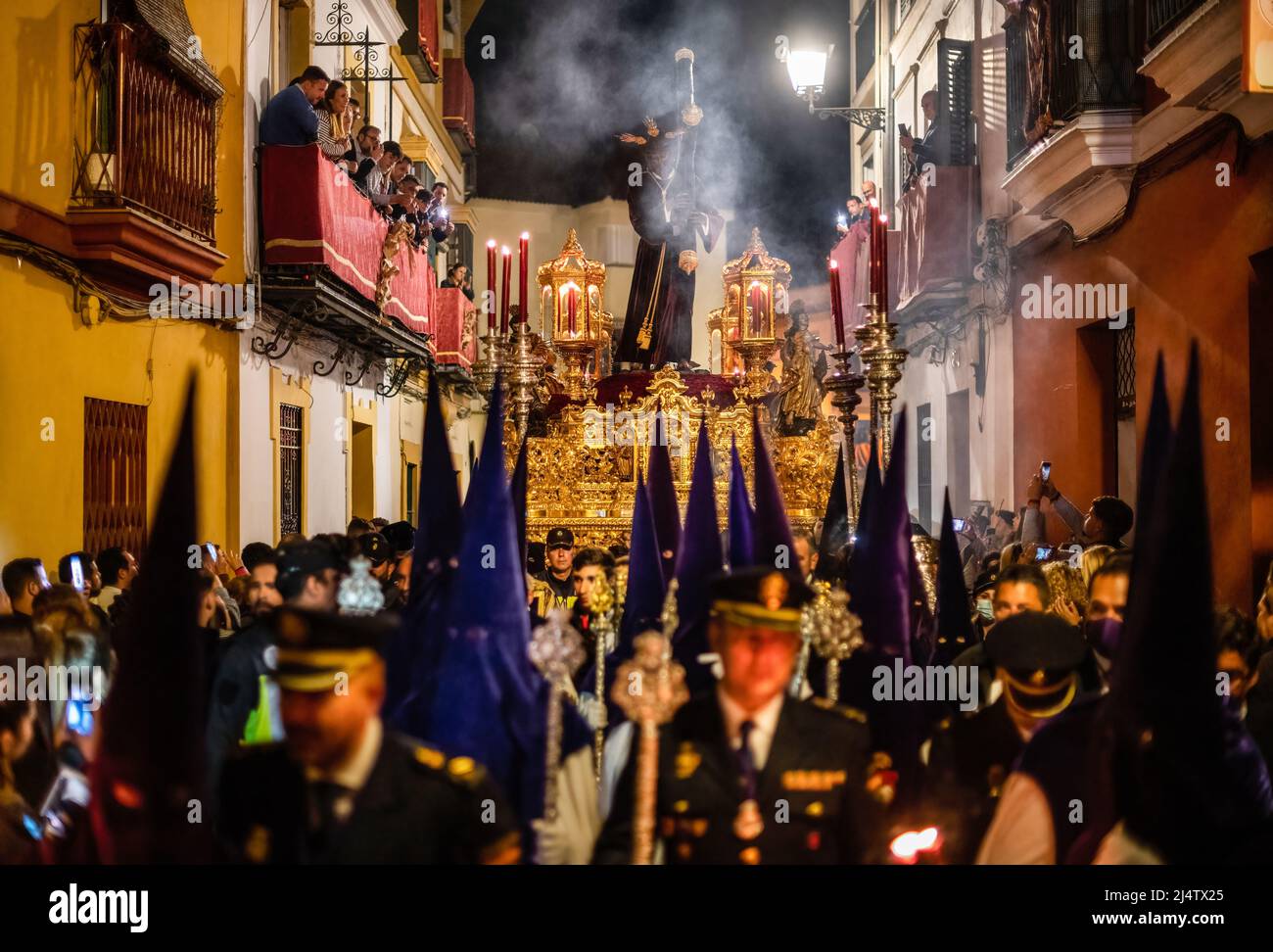 Gypsy brotherhood Penitents (Hermandad de los Gitanos) carry the image ...