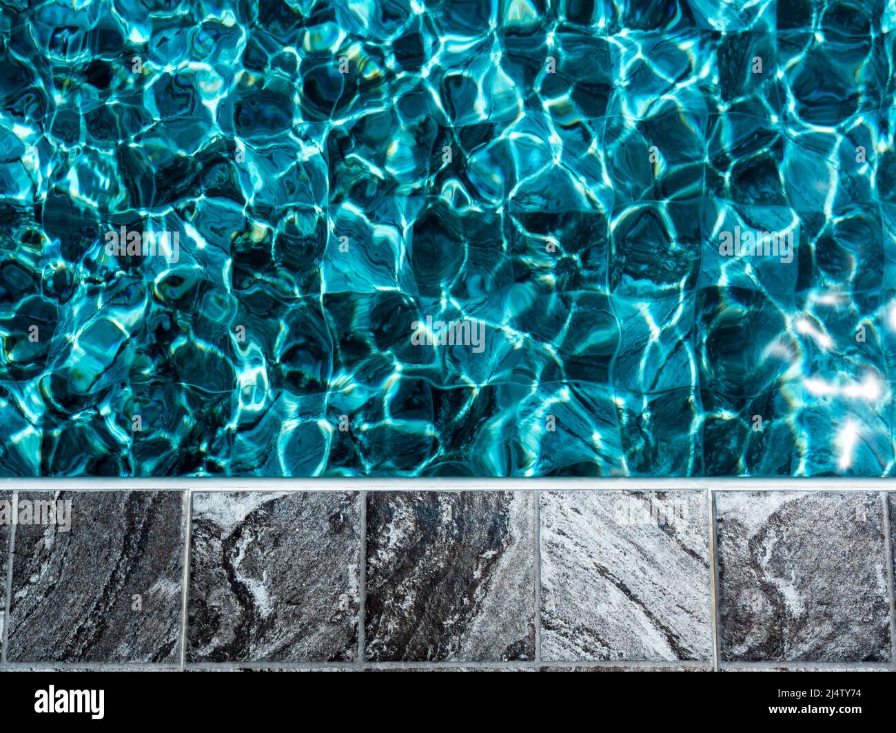 Grey tiles with marble pattern, empty space on the poolside edge floor ...