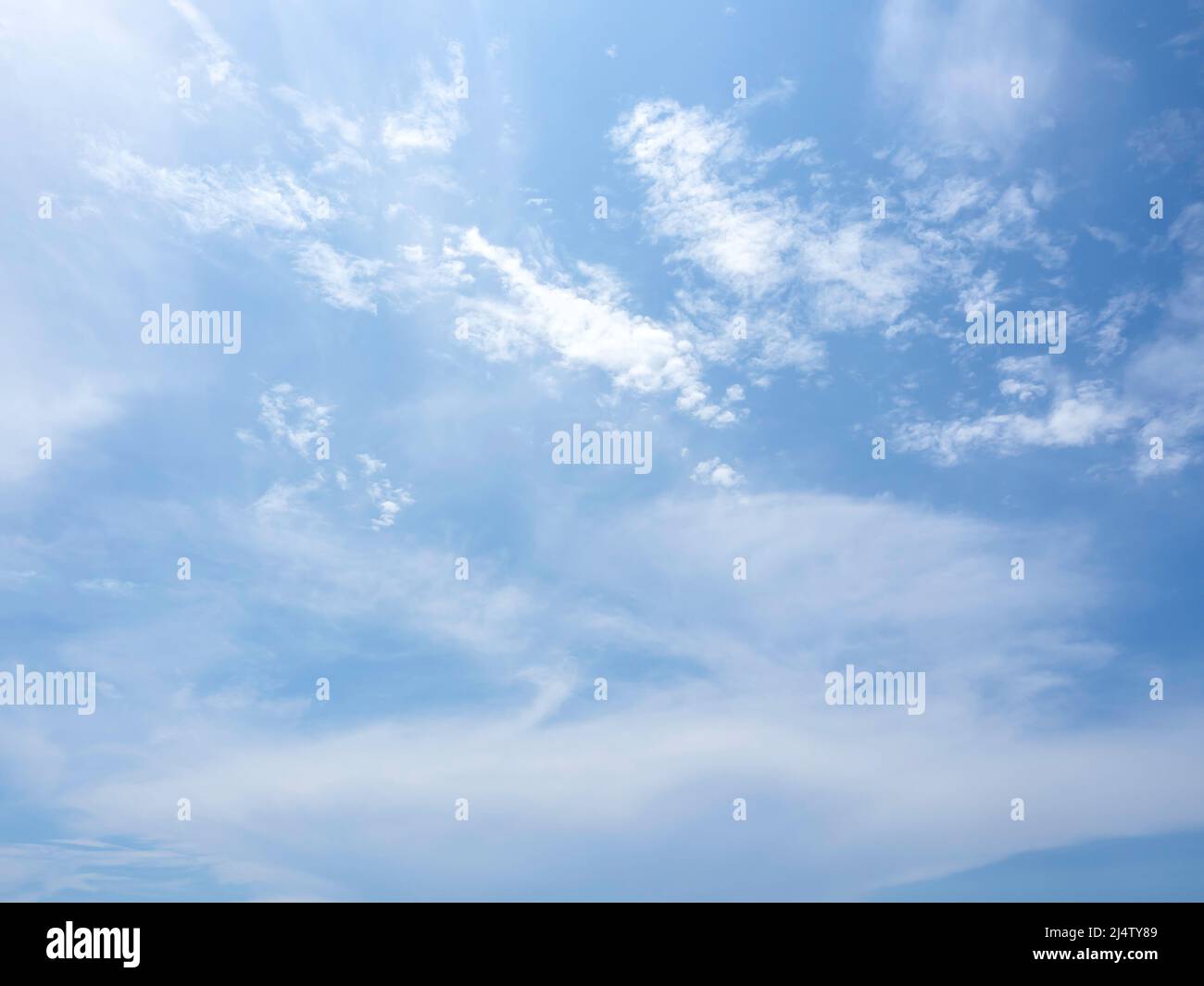 Blue sky background with white clouds. Summer bright clear sky Stock Photo - Alamy