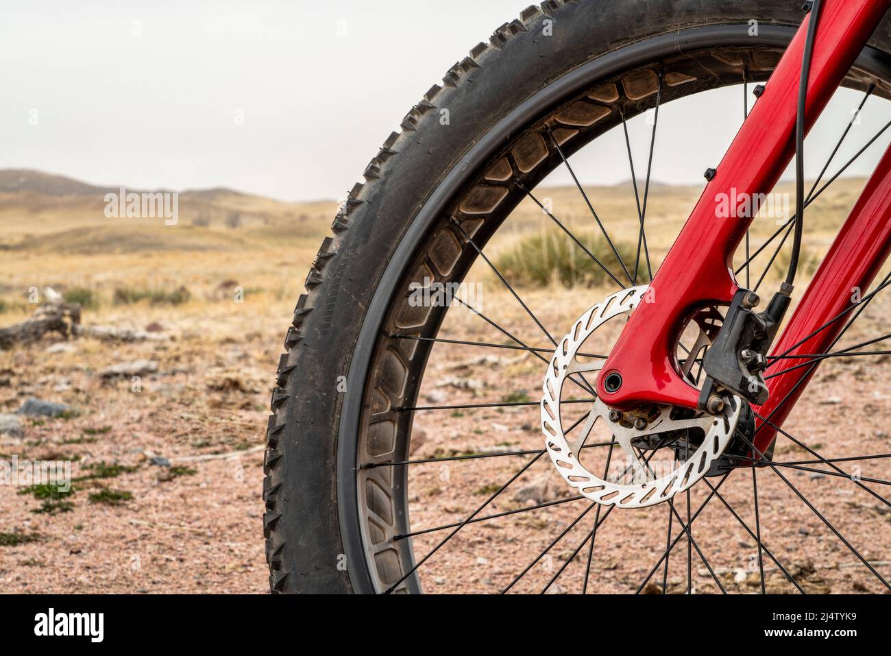 front wheel of a fat mountain bike with a hydraulic disk brake at ...