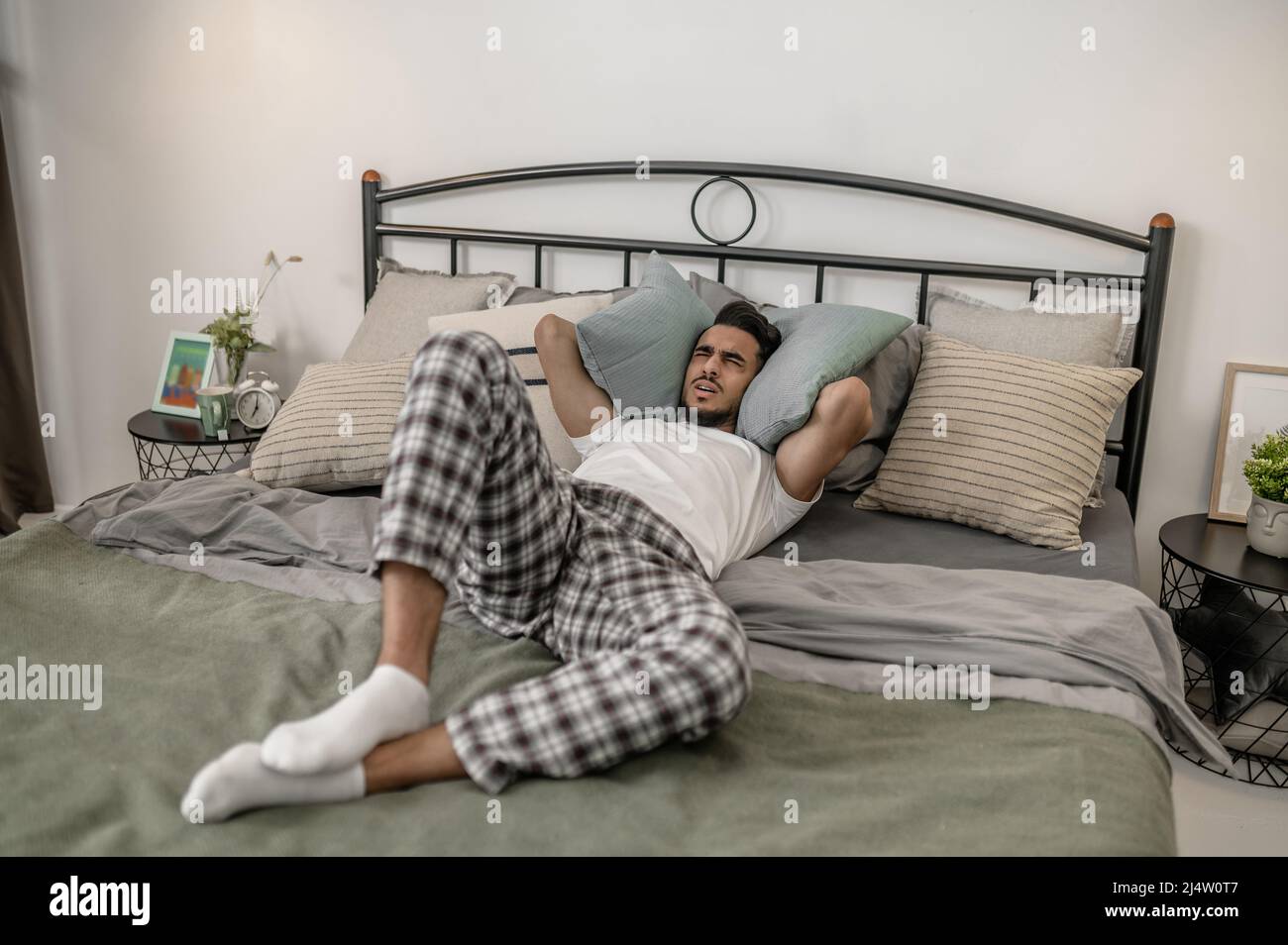 A young man spening day at home and feeling relaxed Stock Photo - Alamy
