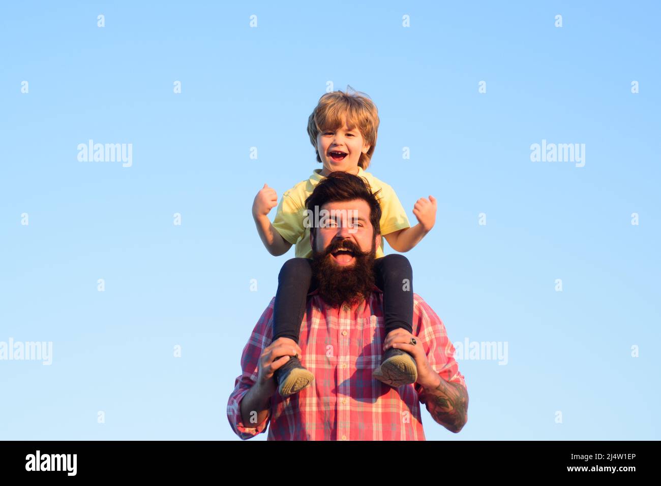 Father giving piggyback ride on hi-res stock photography and images - Alamy