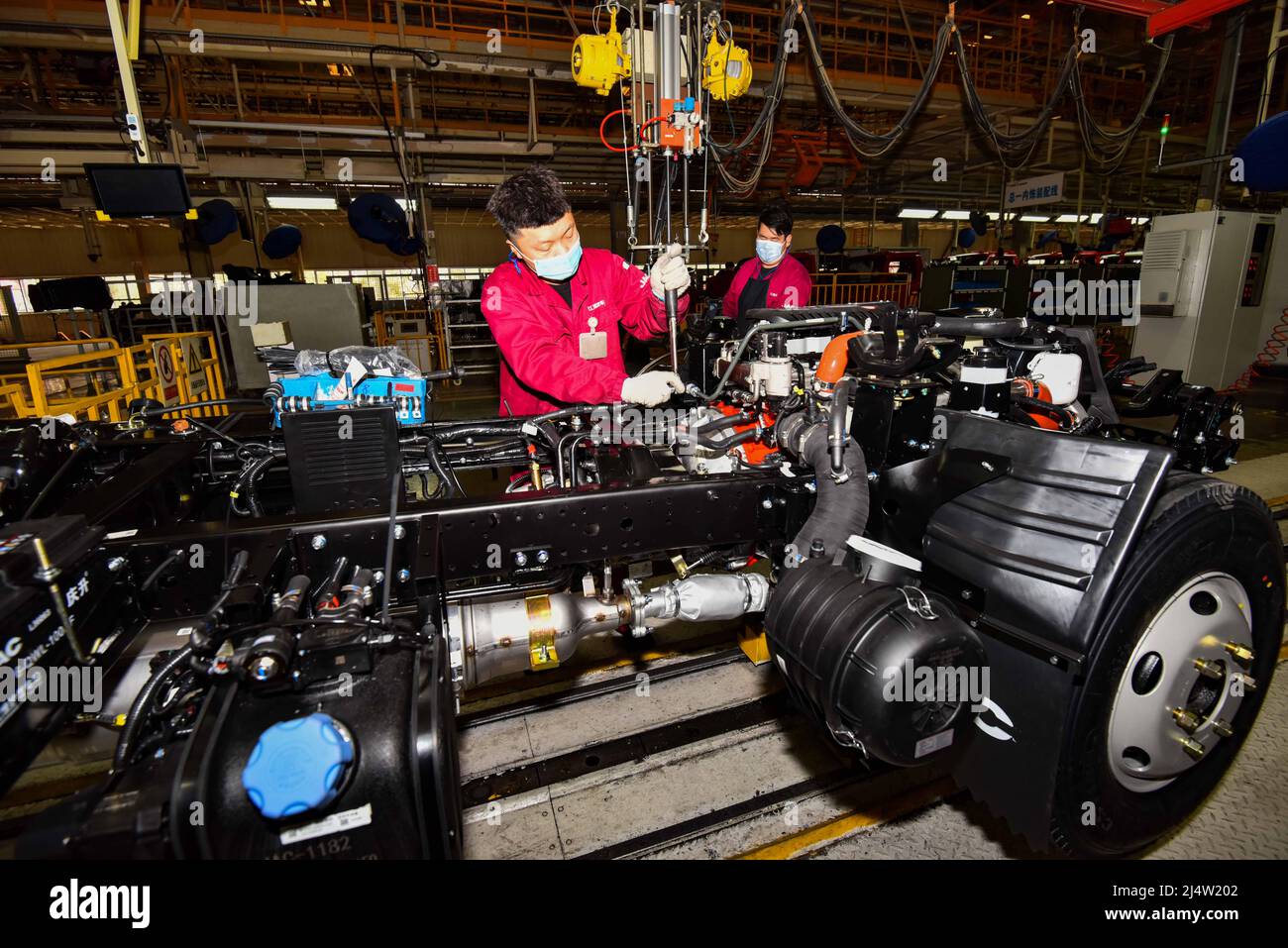 QINGZHOU, CHINA - APRIL 18, 2022 - Workers assemble at the final ...