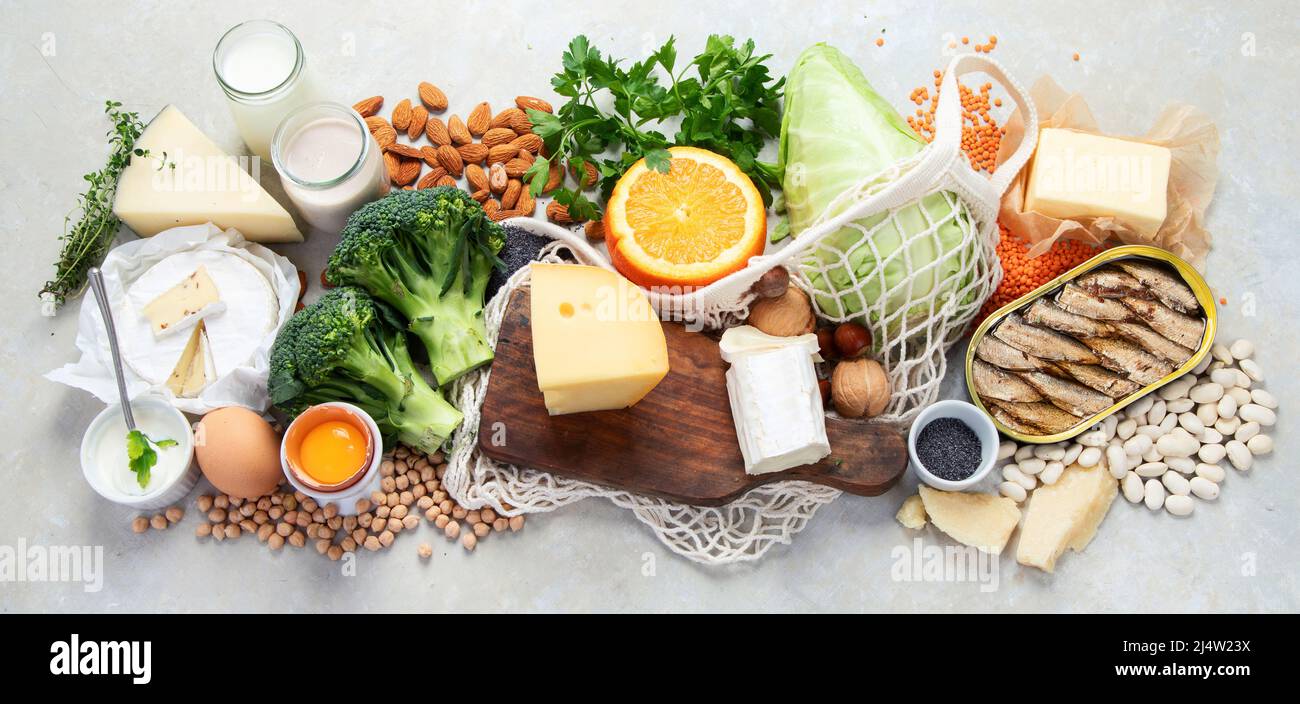 Healthy food high in calcium on light background. Dairy products ...