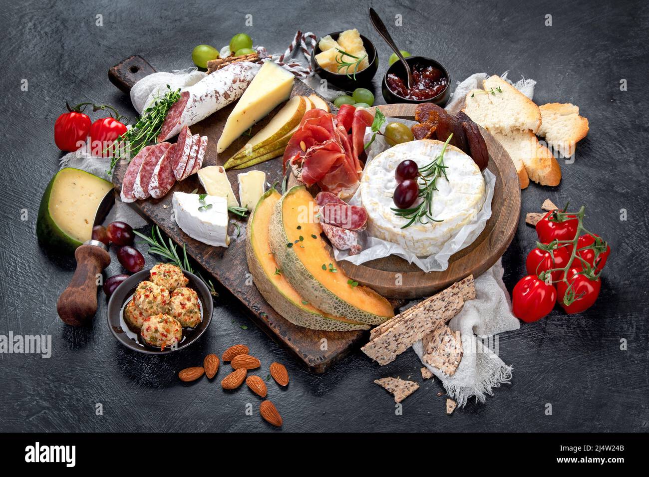 Appetizers assortment on dark background. Mediterranean food concept ...
