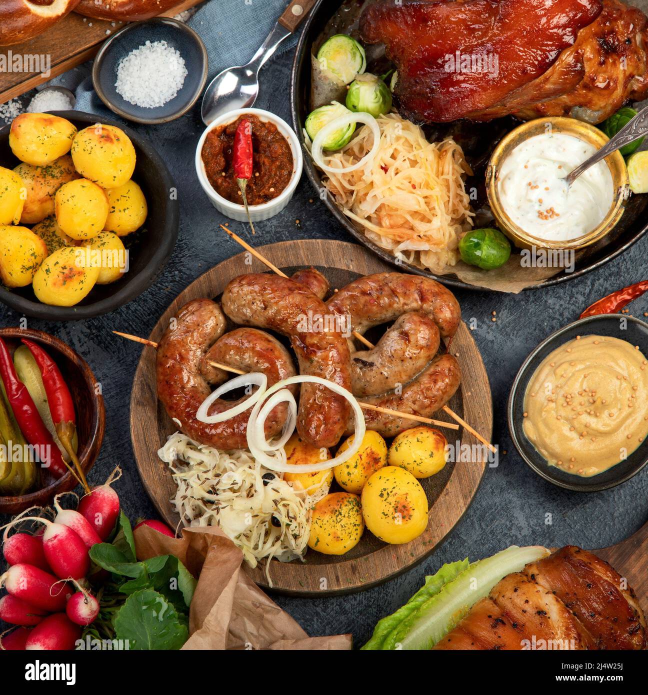 German cuisine on dark background. Traditional food concept. Grilled ...