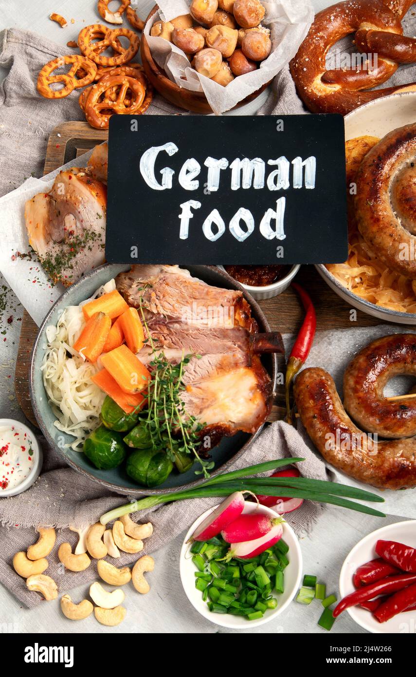 Traditional German cuisine, Schweinshaxe roasted ham hock. Beer ...