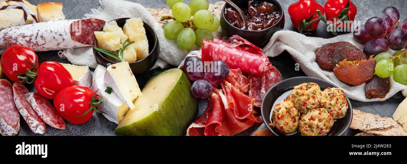 Appetizers assortment on dark background. Mediterranean food concept ...