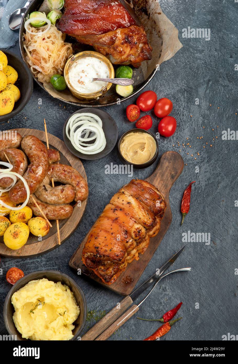 German cuisine on dark background. Traditional food concept. Grilled ...