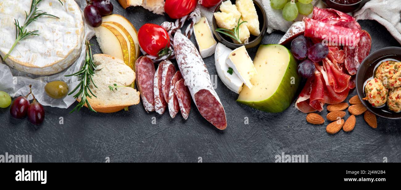 Appetizers assortment on dark background. Mediterranean food concept ...