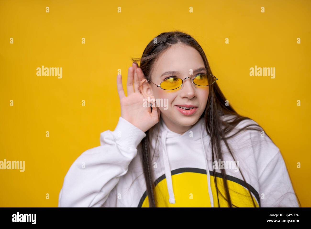 Pretty young girl brunette girl in casual white plumpness, glasses ...