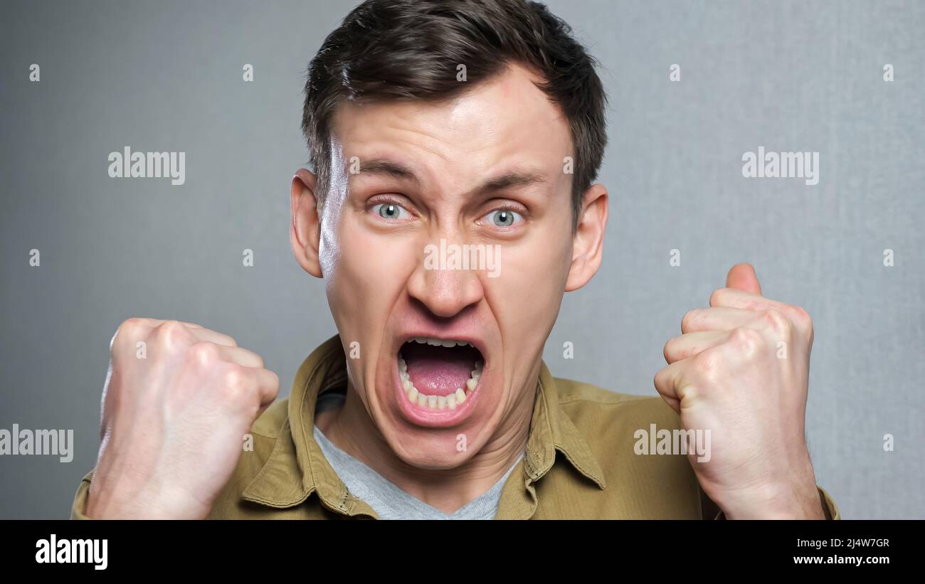 Close up of angry man screaming Stock Photo - Alamy