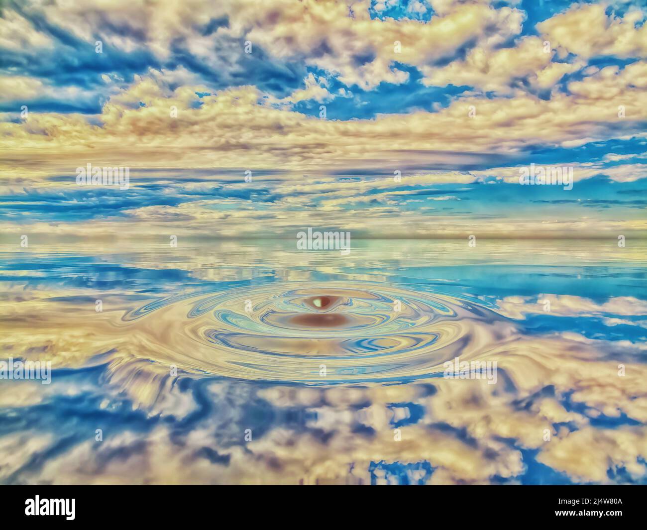 Dramatic storm clouds reflected on undulations in a large body of water ...