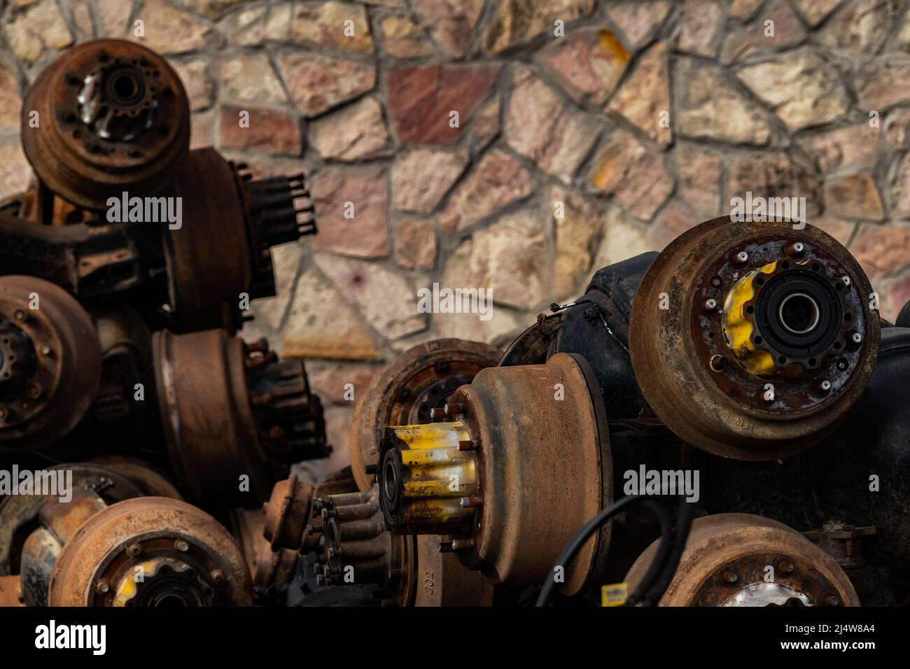 Pile of old rusty truck axle at second hand market shop. Used ...