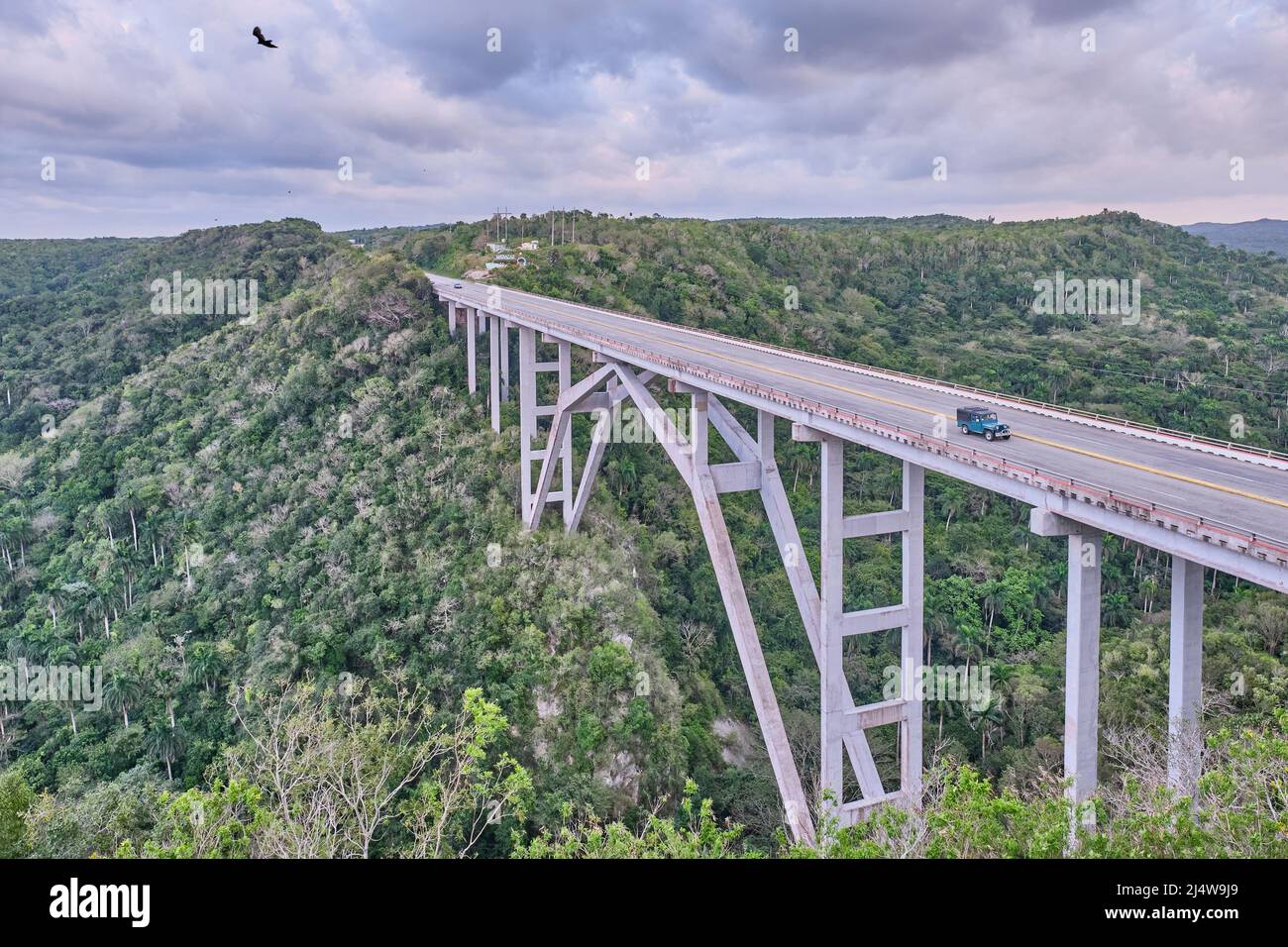 The highest of Cuba Bacunayagua Bridge. Car moving along bridge Stock ...