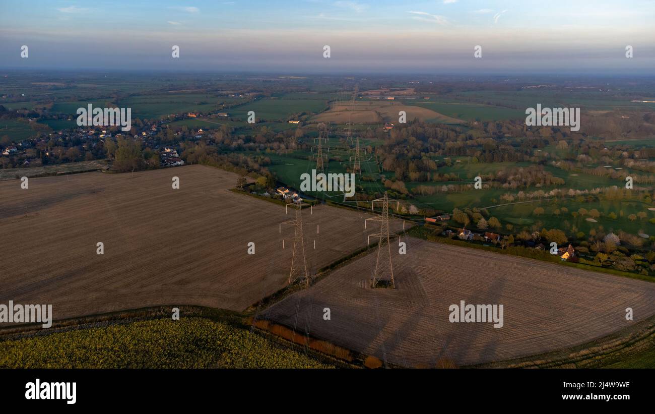 An aerial view of electricity pylons in rural Suffolk, UK Stock Photo ...
