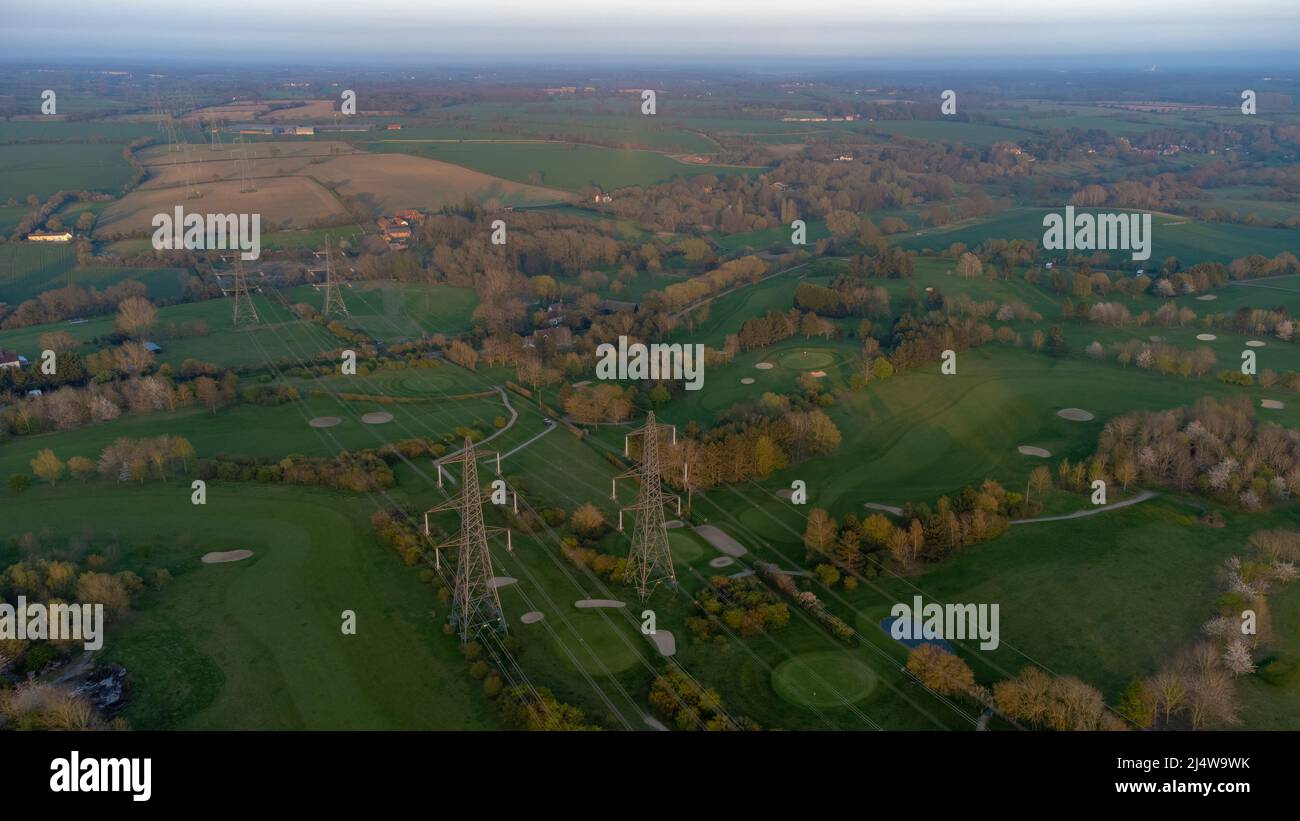 An aerial view of electricity pylons in rural Suffolk, UK Stock Photo ...
