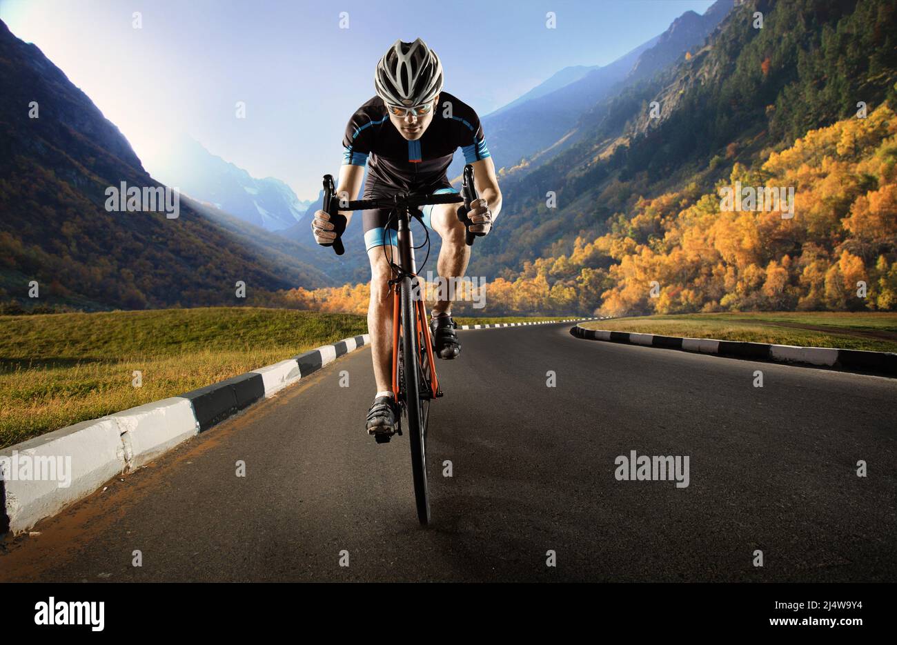 Sport background. The cyclist rides Stock Photo - Alamy