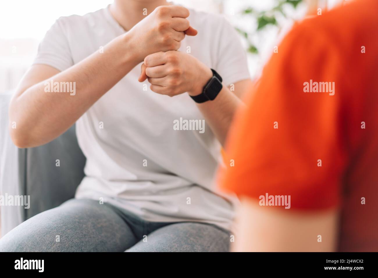 The girl shows the gesture work to the deaf-mute Stock Photo - Alamy