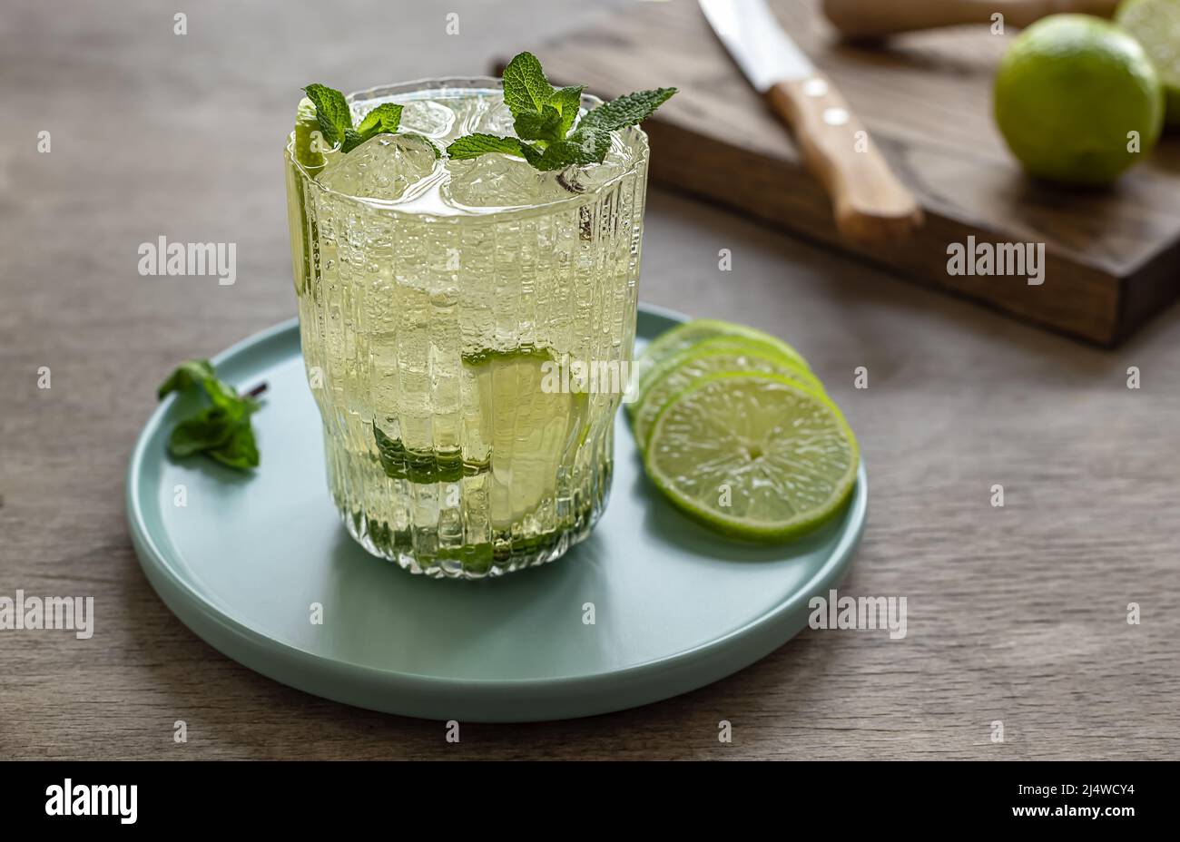Homemade fizzy lime lemonade drink. Also mojito mocktail, or cocktail ...