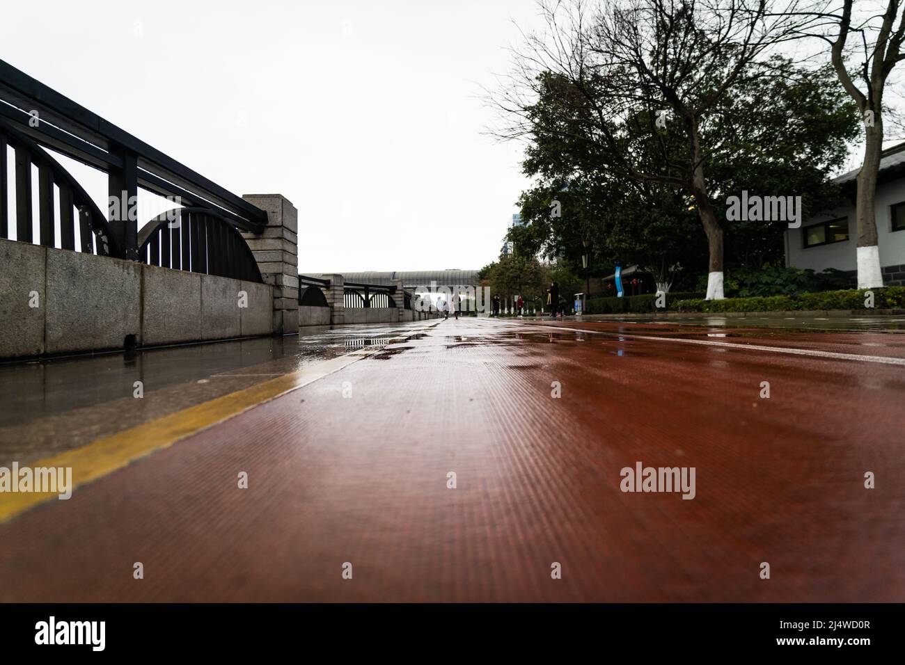 A wet pedestrian path in Wenzhou China near the Ou River Stock Photo ...