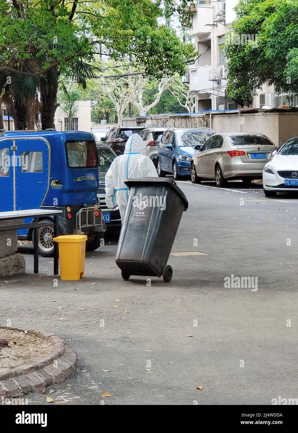 SHANGHAI, CHINA - APRIL 16, 2022 - Volunteers carry garbage in ...