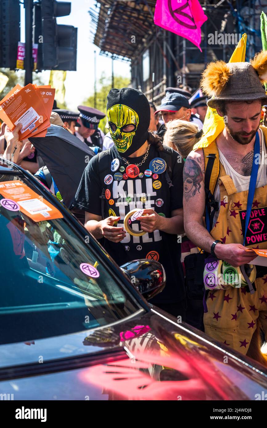 Blocked car with red paint handprints, We Will Not Be Bystanders, an ...
