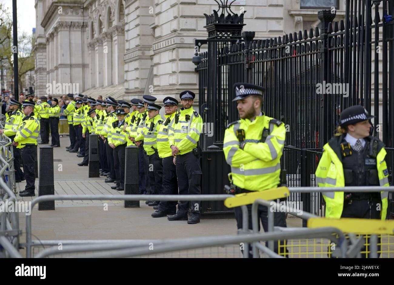 London, England, UK. Line of police officers guarding Downing Street ...