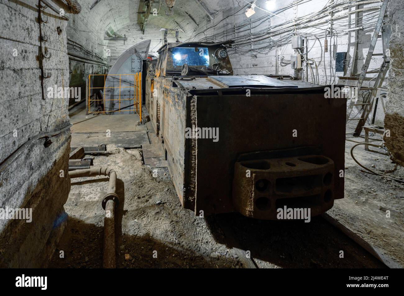 Electric locomotive in an underground tunnel Stock Photo - Alamy