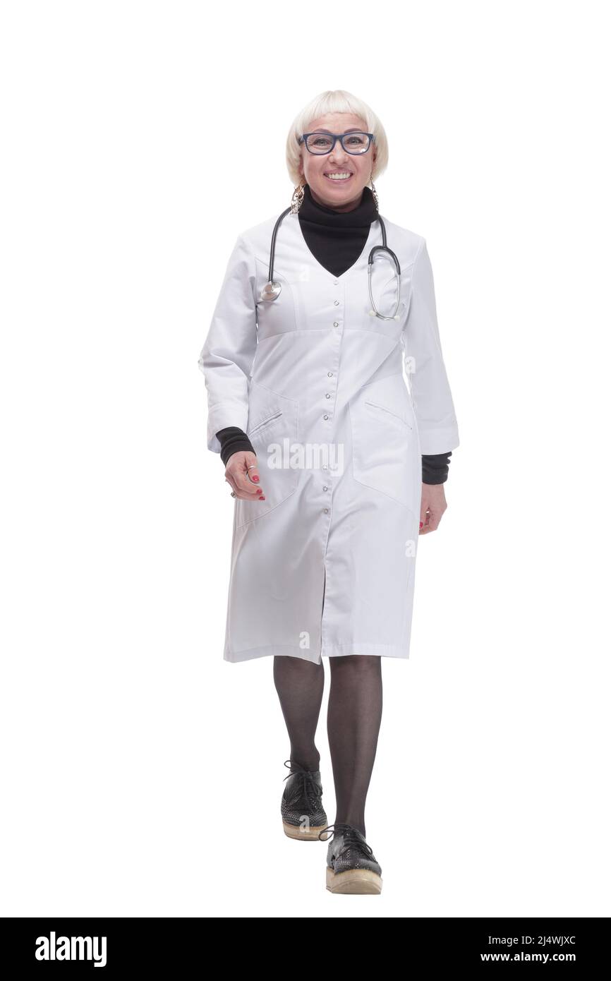 full length. friendly woman doctor walking forward Stock Photo - Alamy